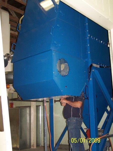 Dalamatic dust collector being installed - InSkip Dust and Fume Extraction